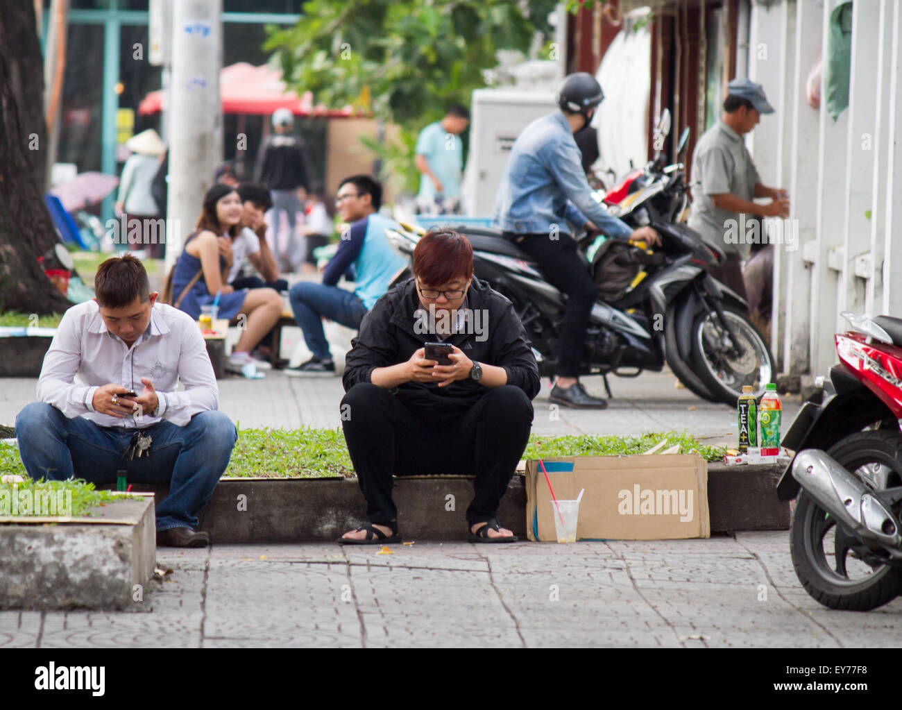 Ho Chi Minh City, Vietnam. 23rd July, 2015. Vietnamese youths use ...
