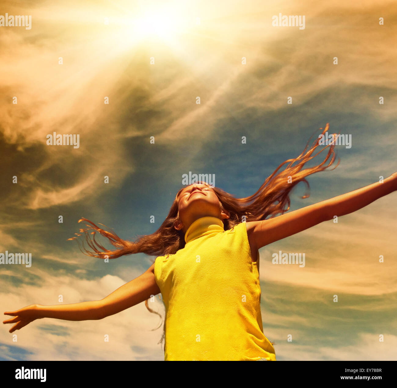 Happy young girl outdoors Stock Photo - Alamy