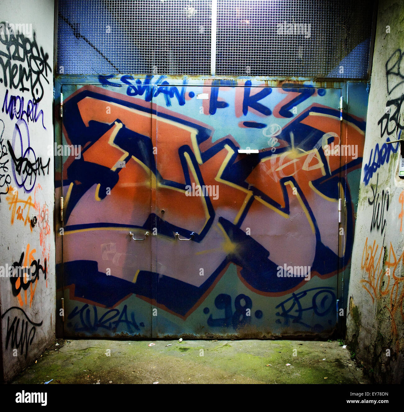 Graffiti painted gateway Stock Photo - Alamy