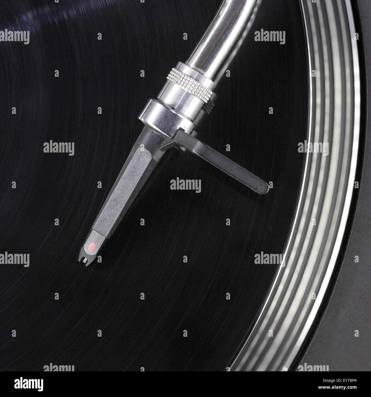 Dj needle stylus on spinning record, closeup Stock Photo - Alamy