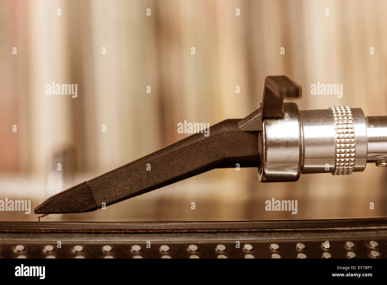 Dj needle stylus on spinning record, vinyl background Stock Photo - Alamy