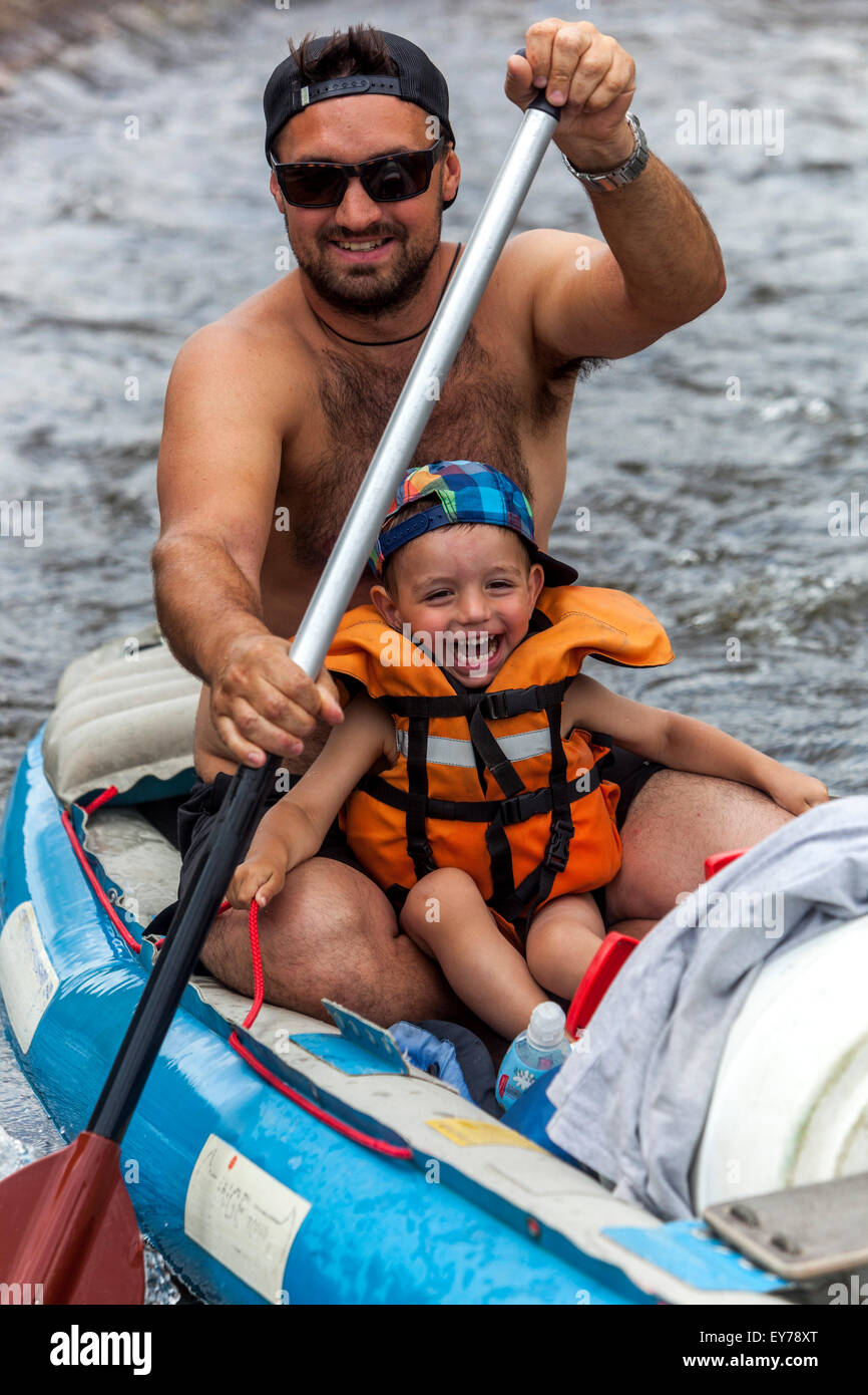 People going down by the Vltava river rafting Czech Republic river ...