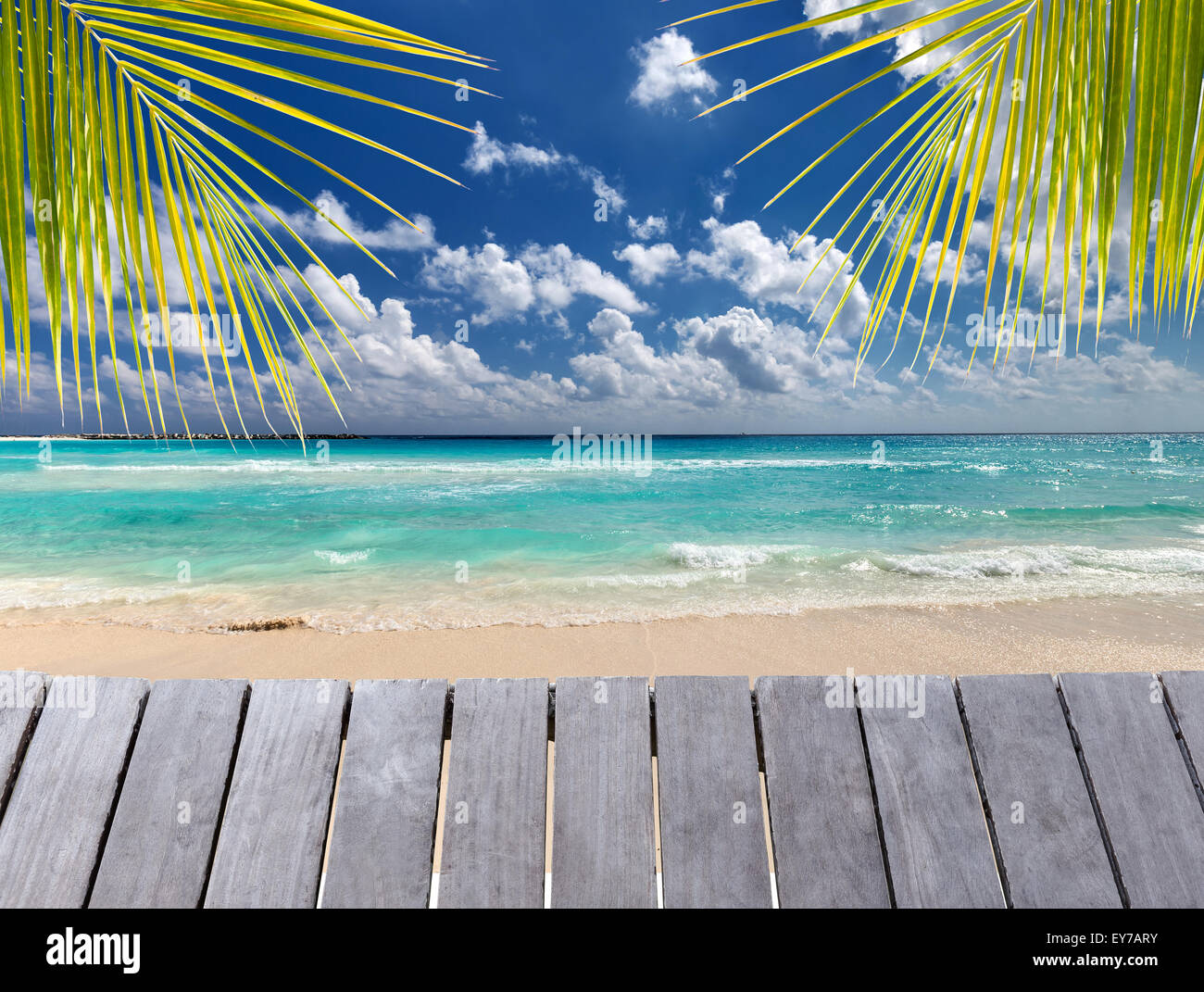 Wooden pier on caribbean beach view Stock Photo - Alamy