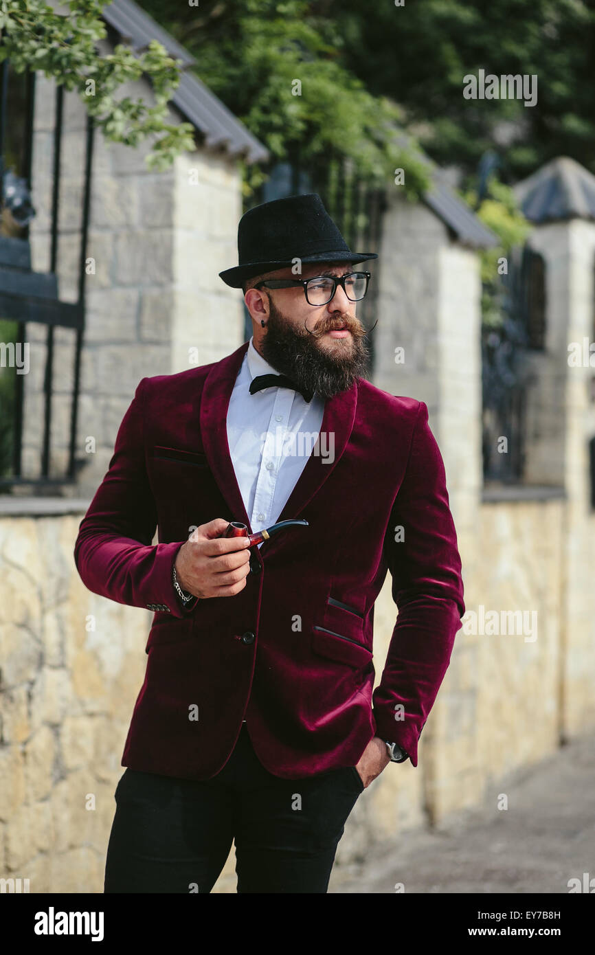 rich man with a beard, thinking about business Stock Photo - Alamy