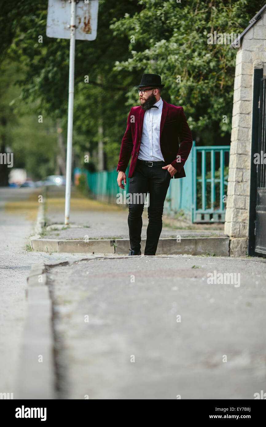 rich man with a beard, thinking about business Stock Photo - Alamy