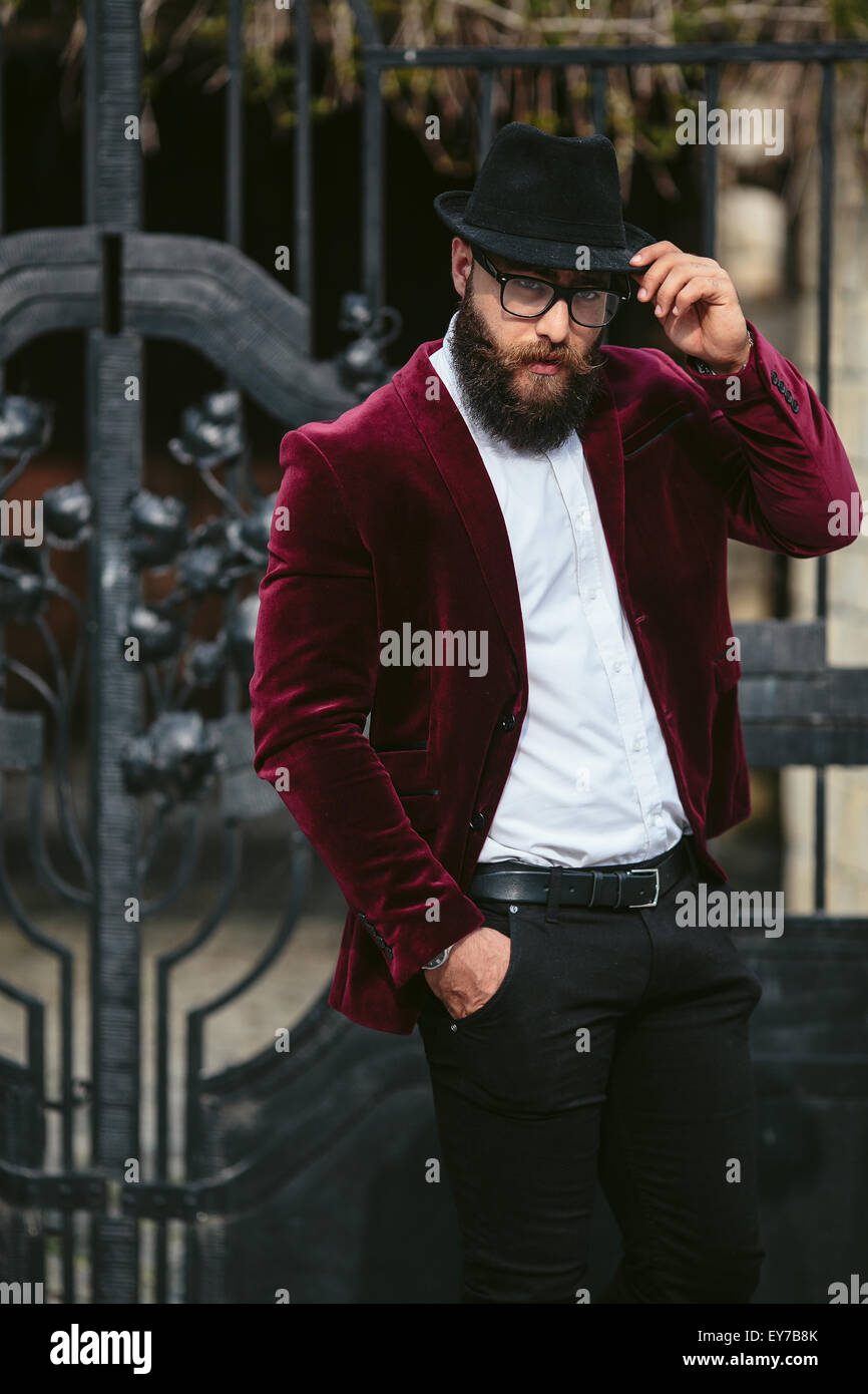 rich man with a beard, thinking about business Stock Photo - Alamy