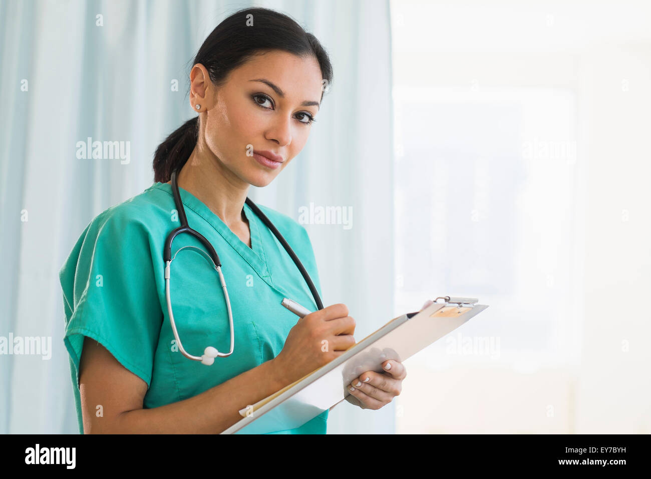 Young doctor making notes hi-res stock photography and images - Alamy