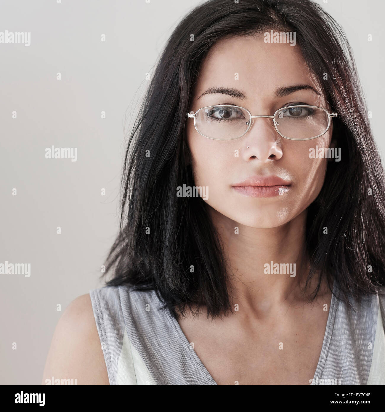 Portrait of young woman smiling 20 29 years hi-res stock photography ...
