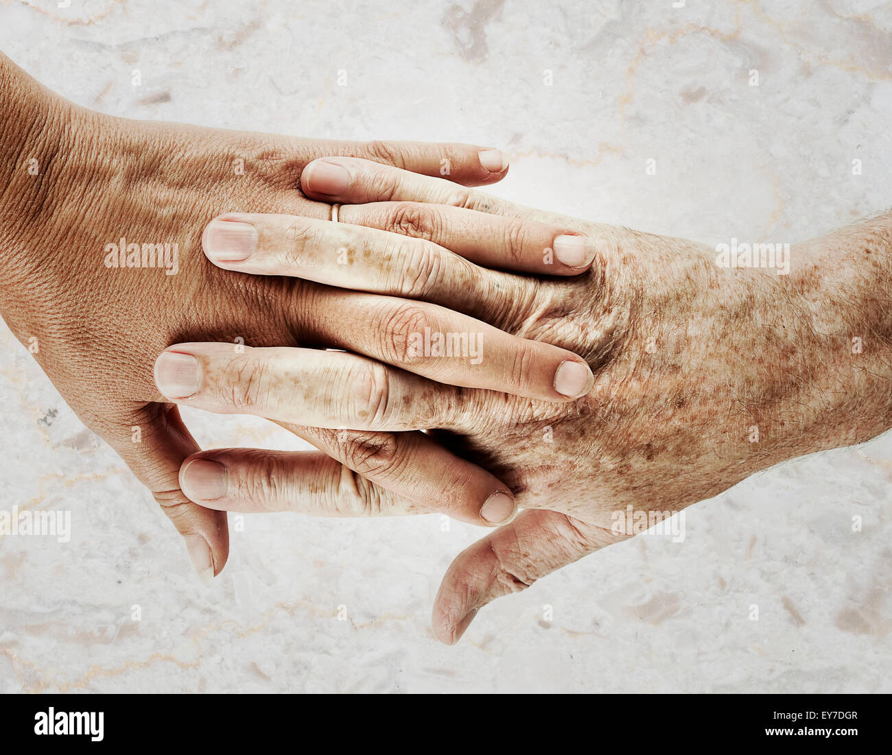 Interlinked hands hi-res stock photography and images - Alamy