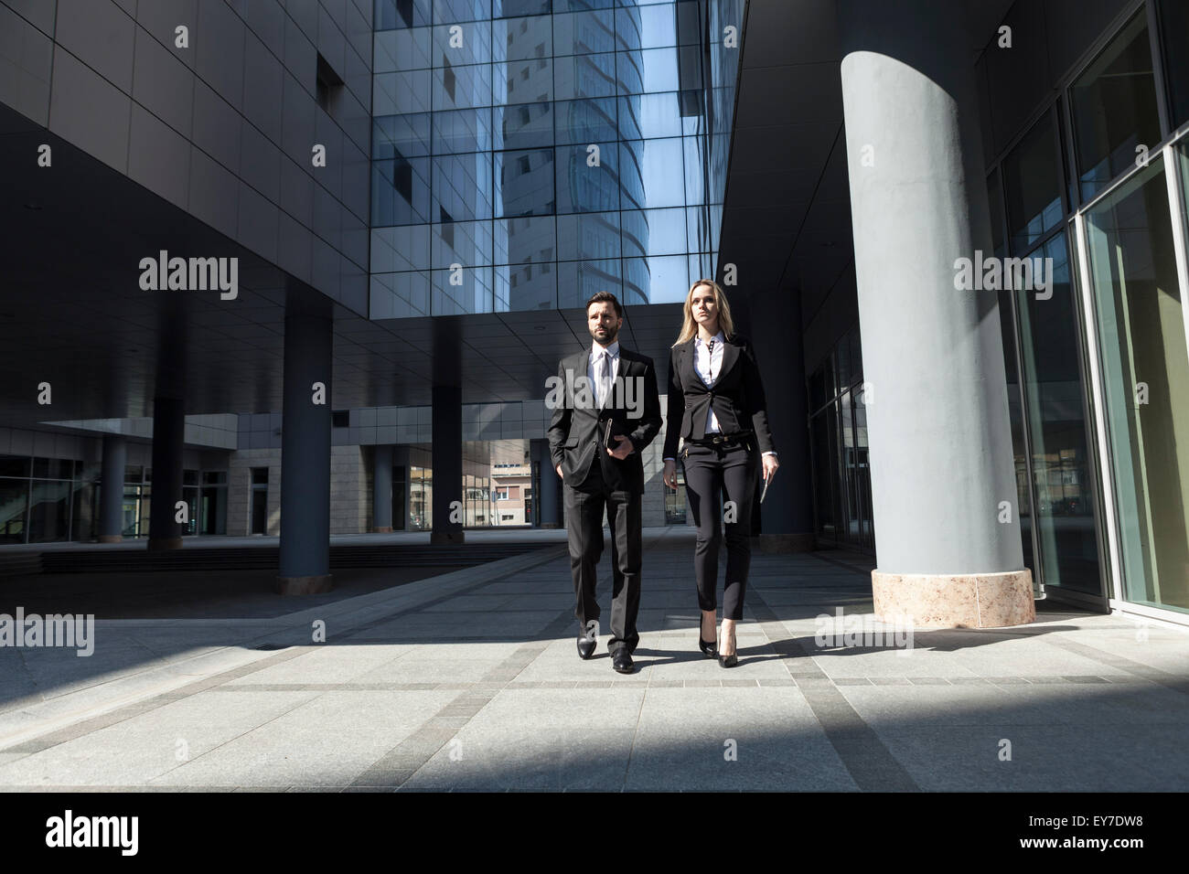 Business partners walking hi-res stock photography and images - Alamy