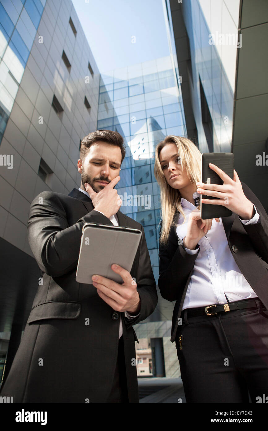 Business partners talking outdoors Stock Photo - Alamy