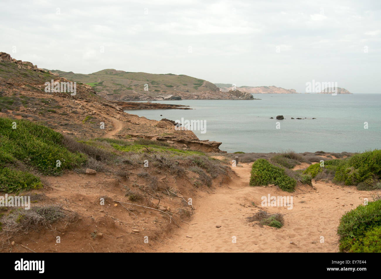 The rocky northern coastal path of the Cami de Cavalls bridal trail on ...