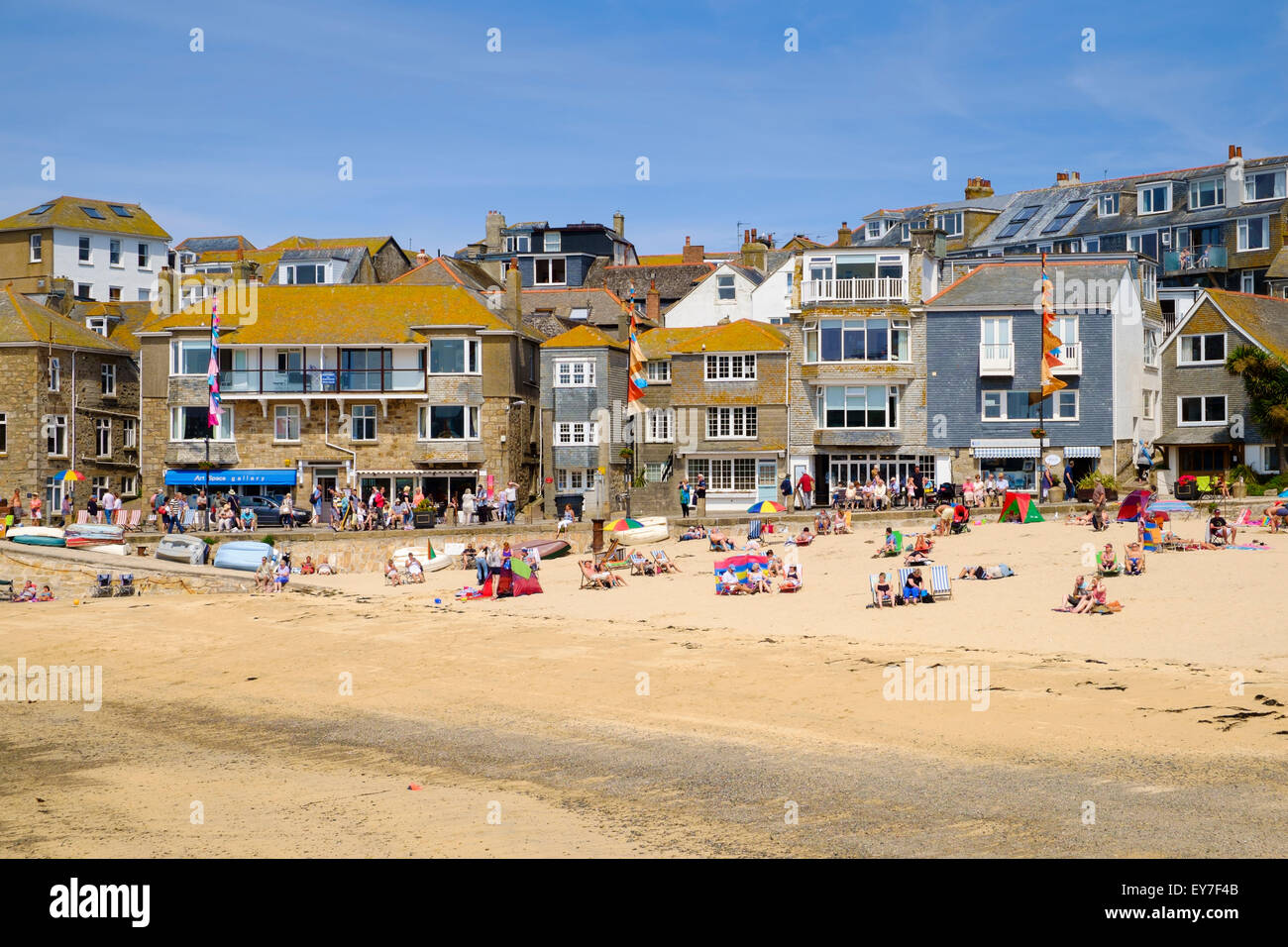 Cornwall beach with people sunbathing at St Ives, Cornwall, England, UK ...