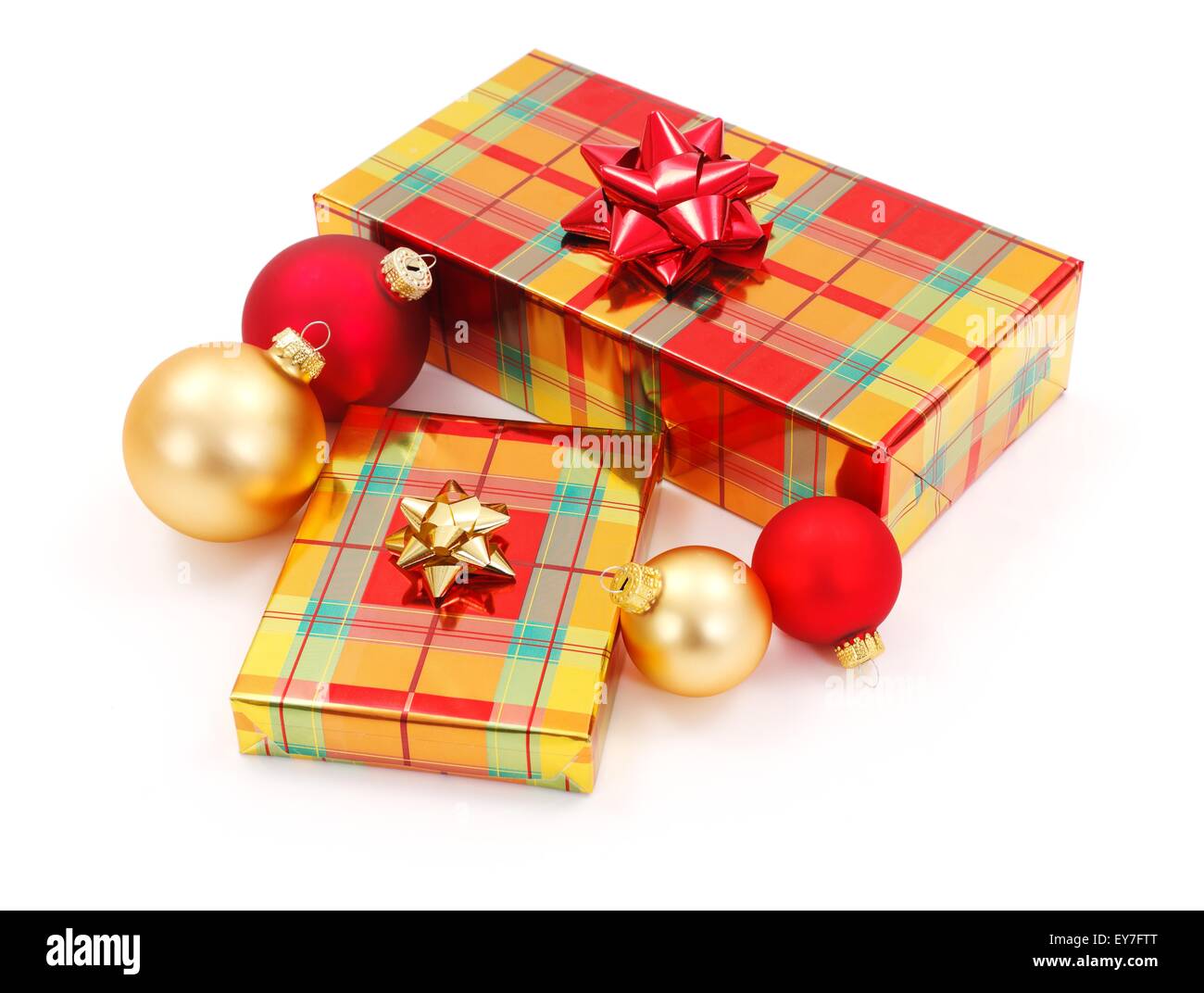 Shiny Christmas Presents and ornament globes in red and gold colors ...