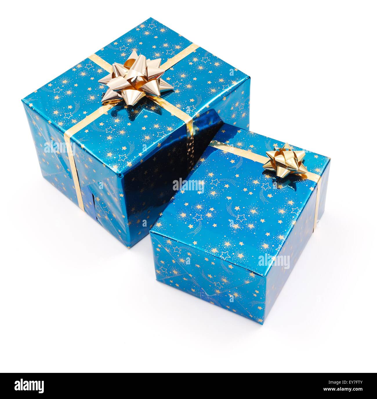 Two gifts on white, wrapped with shiny blue decorated paper Stock Photo ...