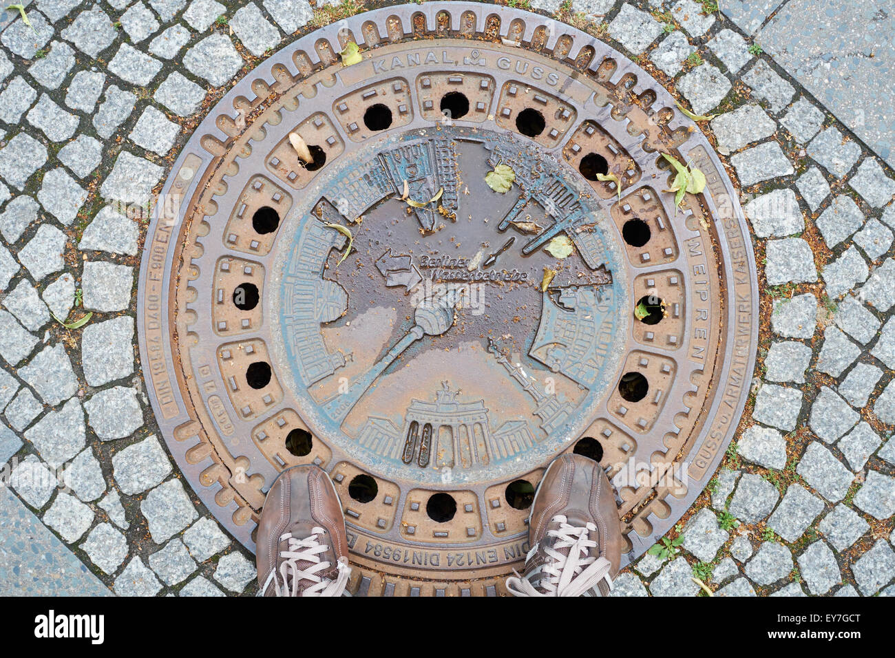 BERLIN, GERMANY - JULY 08: Berlin manhole cover design depicting TC ...