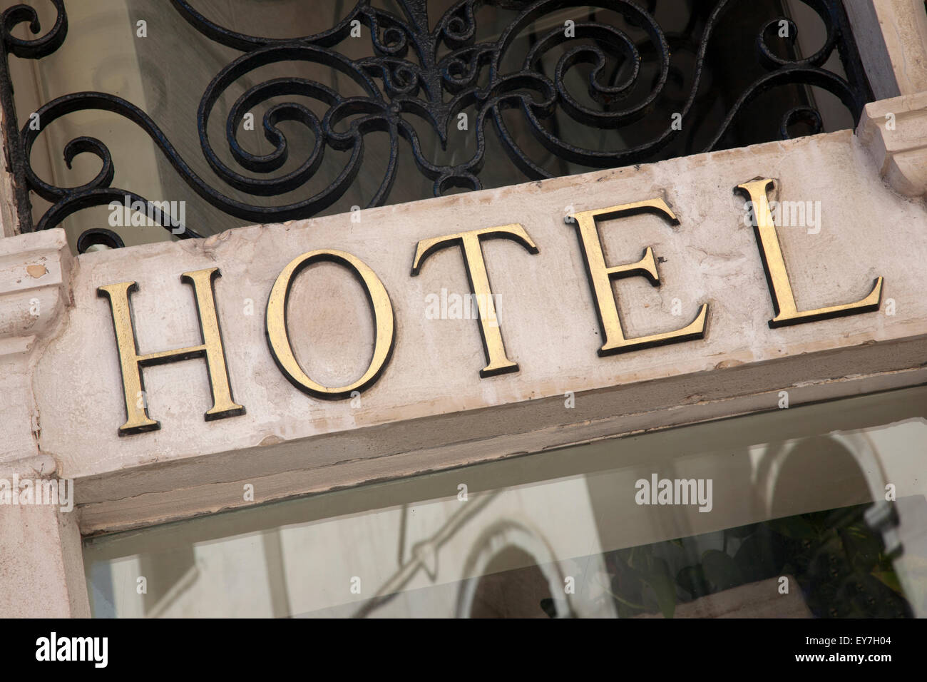 Hotel Sign above Building Entrance Stock Photo - Alamy