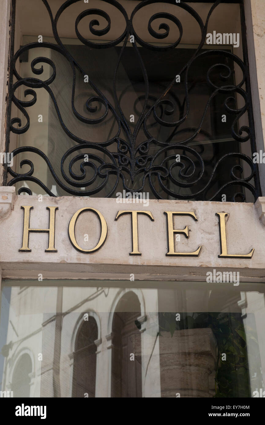 Hotel Sign above Building Entrance Stock Photo - Alamy