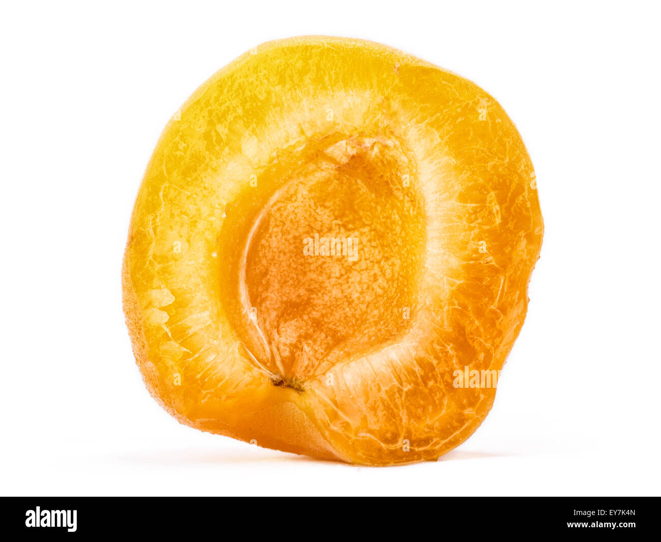 Apricot halves fruits isolated on white background Stock Photo - Alamy