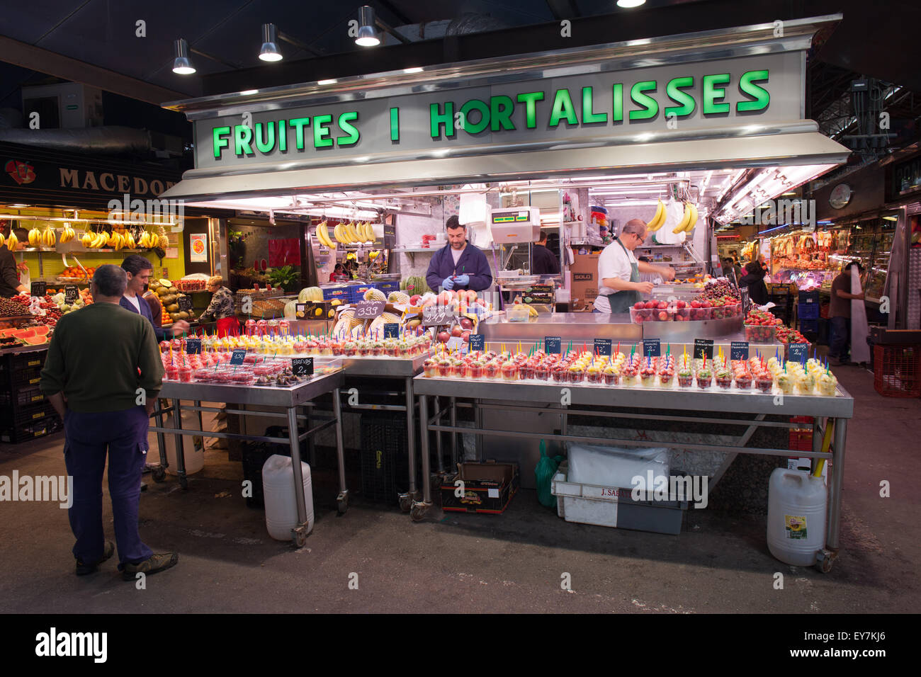 Stall with fresh prepared fruits in La Boqueria food market in ...