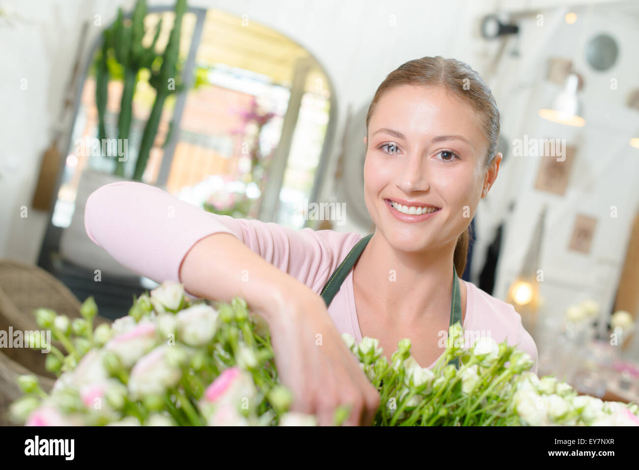 Florist arranging some flowers Stock Photo - Alamy