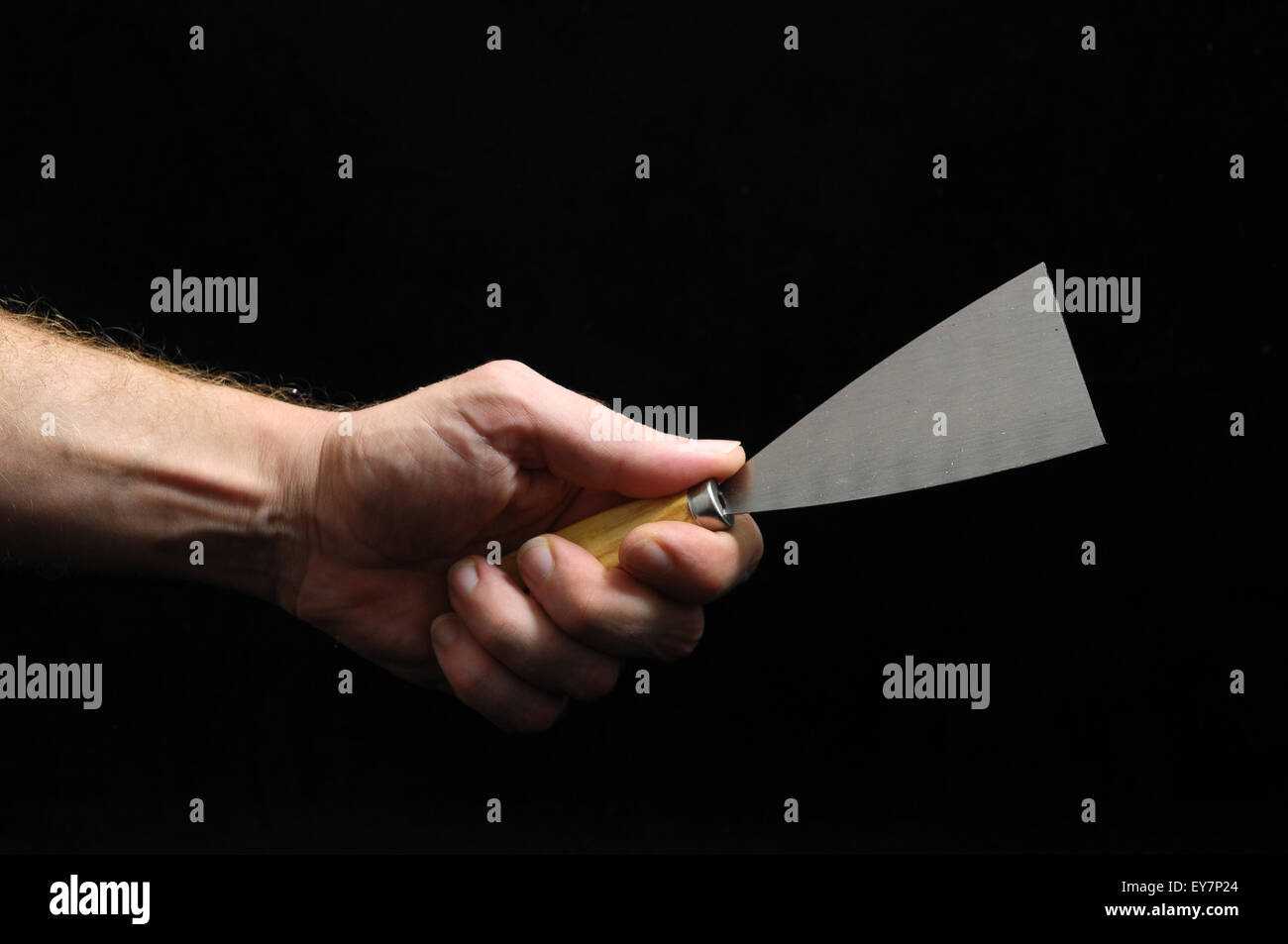 One Spatula and a Hand Stock Photo - Alamy