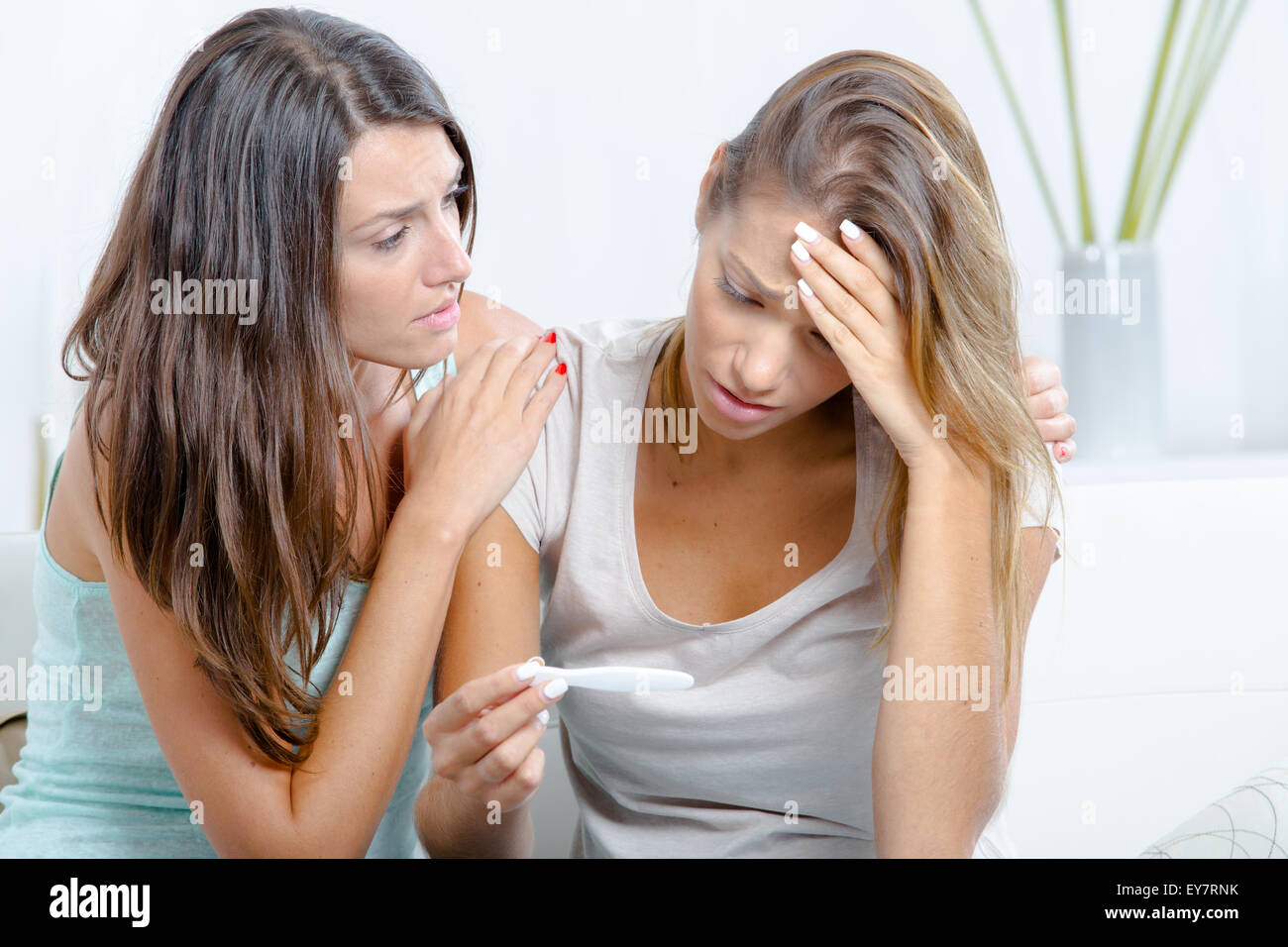 Woman finding out she is pregnant Stock Photo - Alamy
