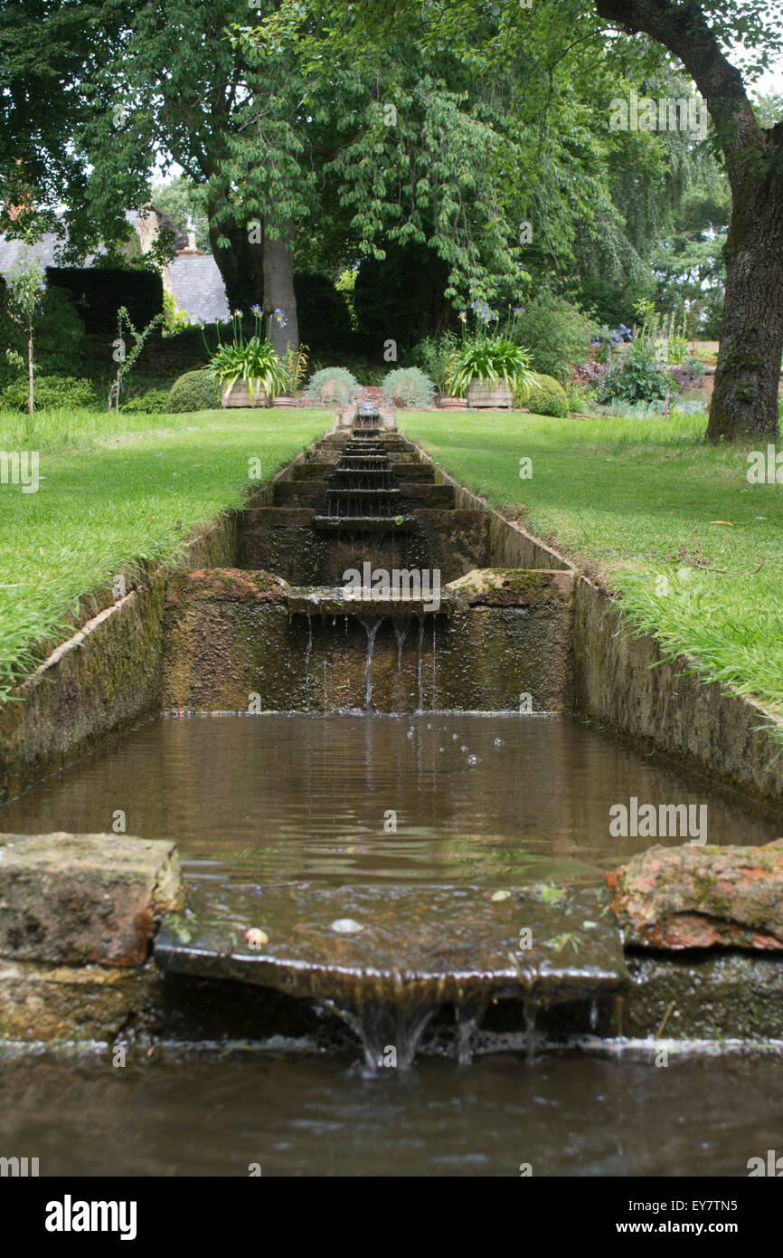 Ornamental water feature at Coton Manor Gardens, Nr Guilsborough ...