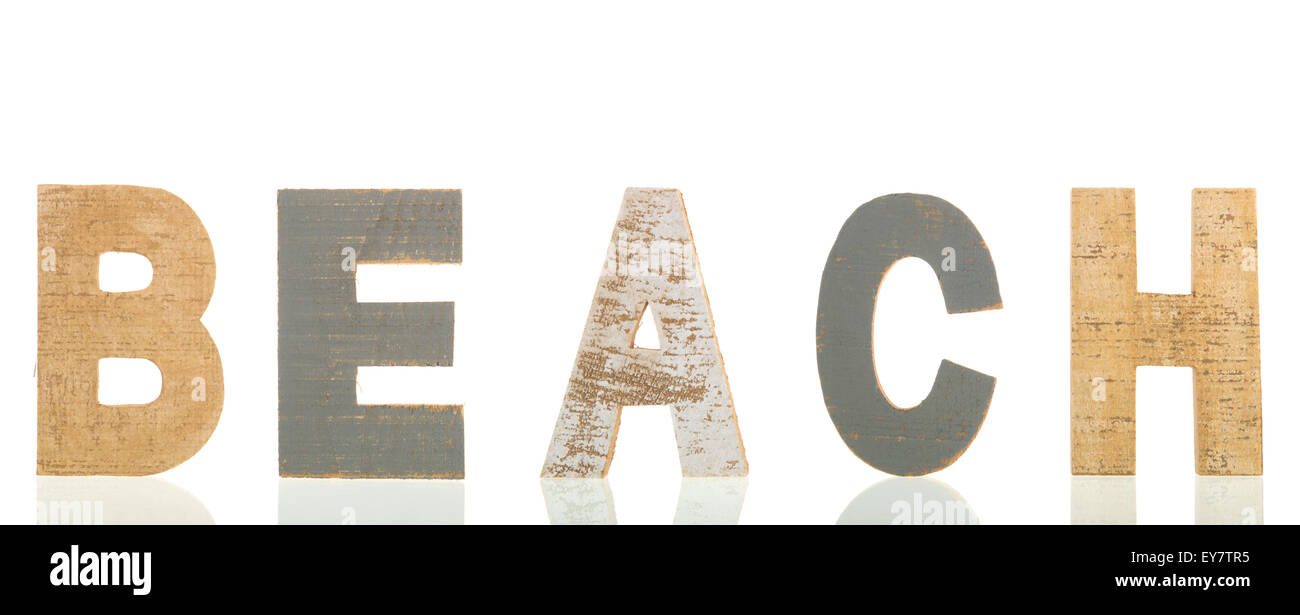 old vintage letters with the word beach isolated over white background ...