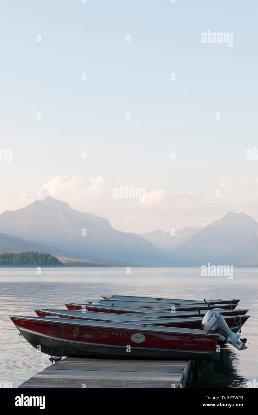 Boats on the jetty during a quiet evening at the lakeside in Apgar on ...