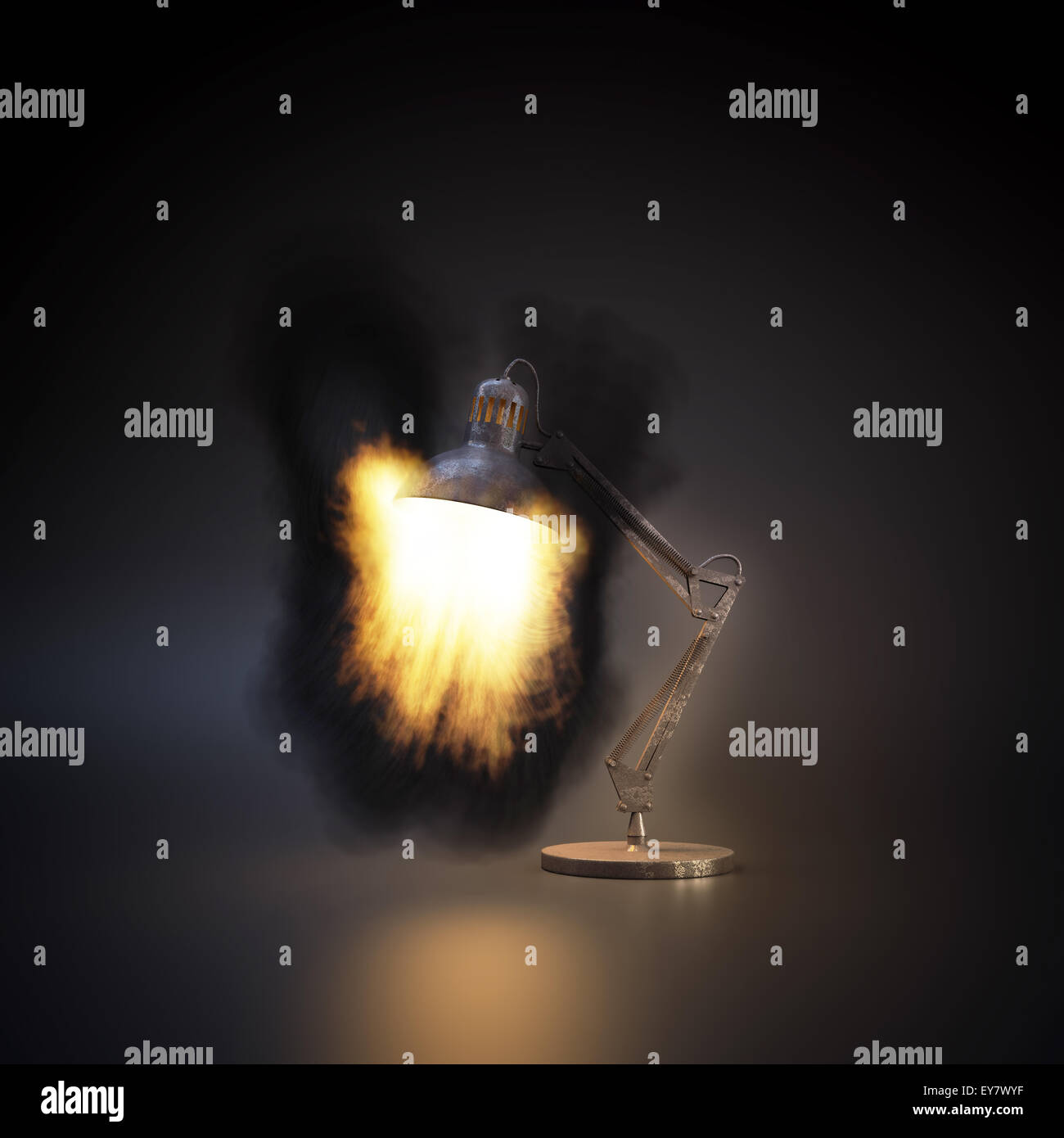 Fire blazing from a desk lamp Stock Photo - Alamy