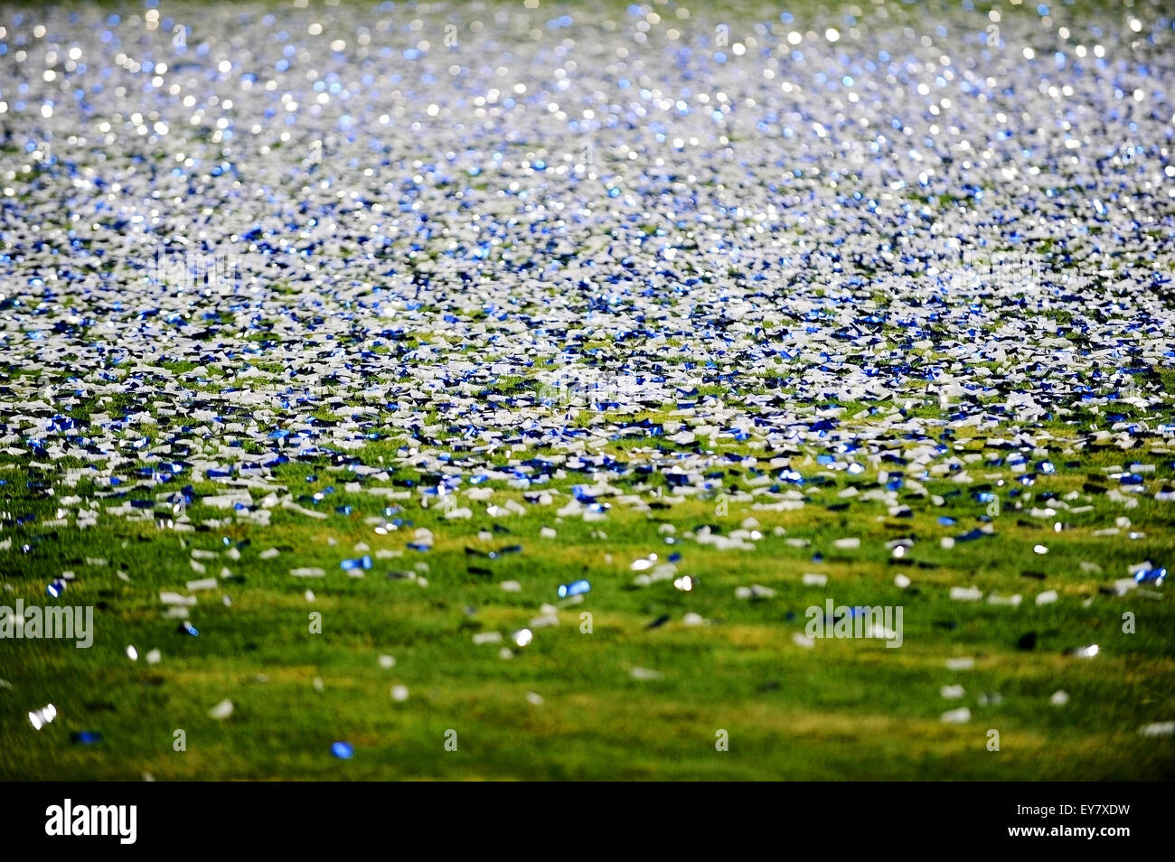 Lots of confetti on a turf soccer field after a celebration moment ...