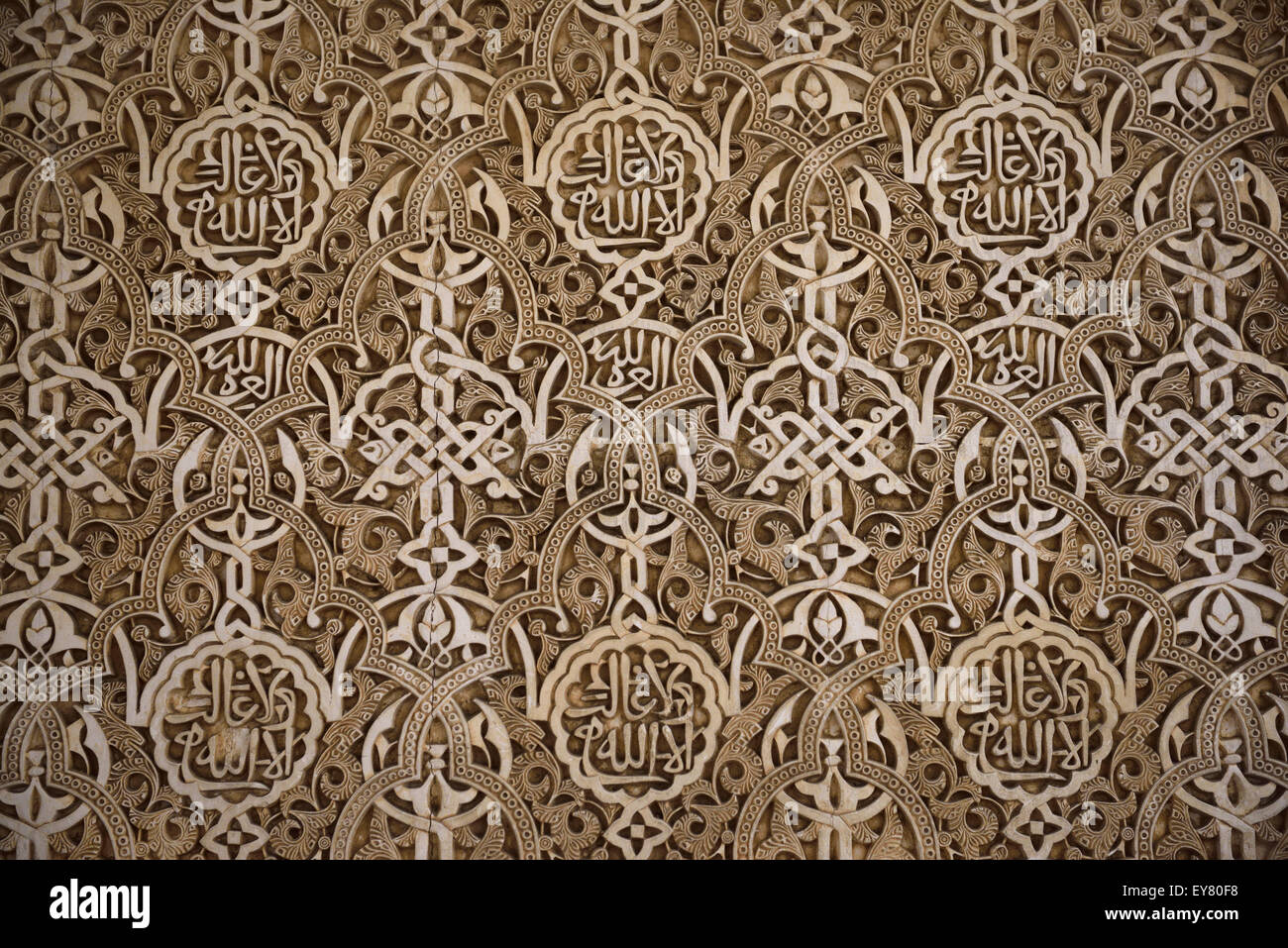 Detail of arabesque wall designs at the courtyard of the Lions of ...