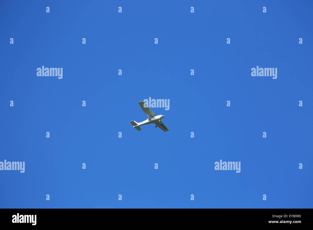 Airplane flying in the sky Stock Photo - Alamy