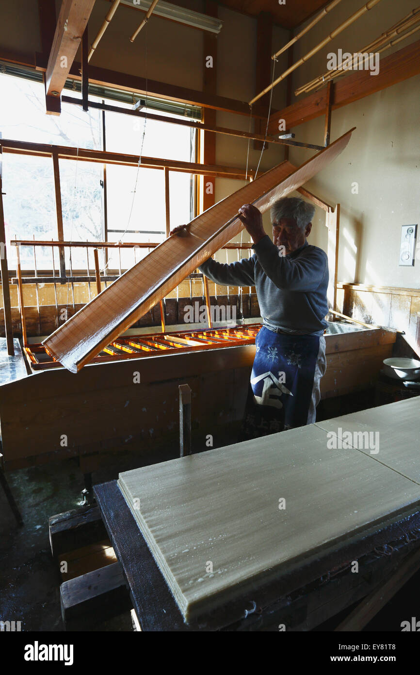Japanese traditional paper craftsman working in his studio Stock Photo ...