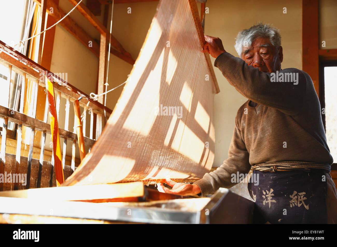 Japanese traditional paper craftsman working in his studio Stock Photo ...