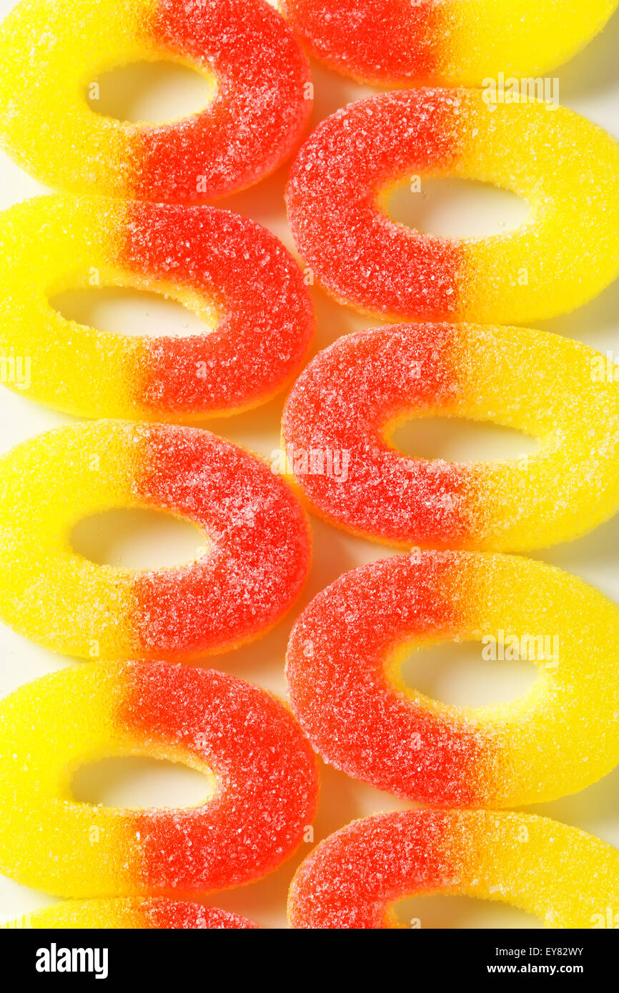 Ring-shaped gummies coated in sugar Stock Photo - Alamy