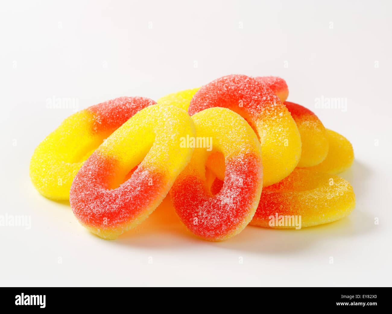 Ring-shaped gummies coated in sugar Stock Photo - Alamy