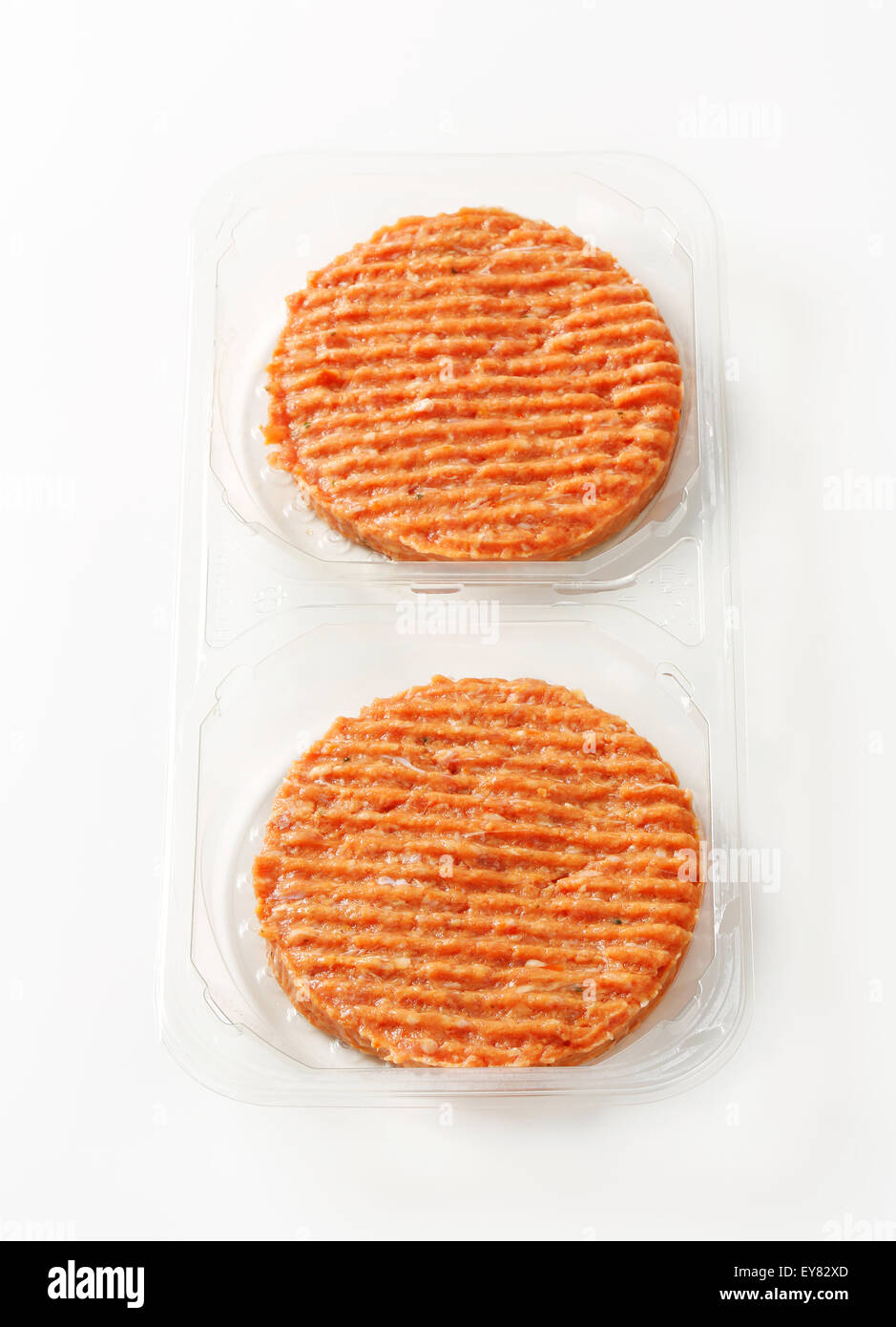Raw burger patties in plastic packaging Stock Photo - Alamy