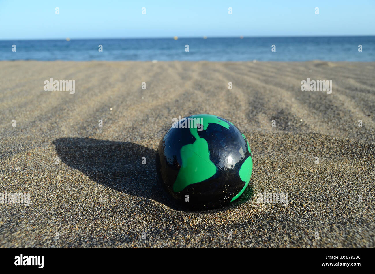 Globe Earth on the Beach Stock Photo - Alamy