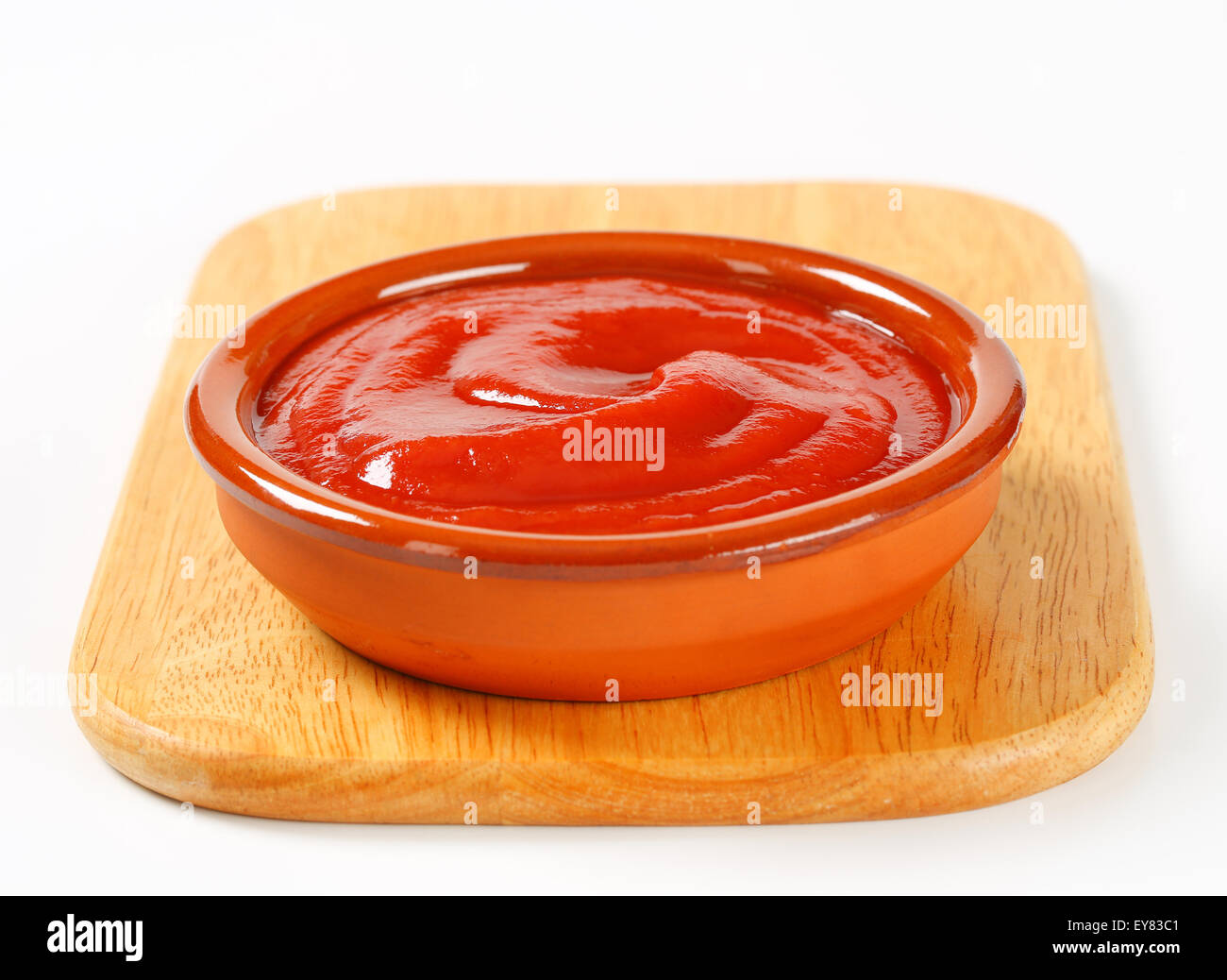 Bowl of smooth tomato passata Stock Photo - Alamy