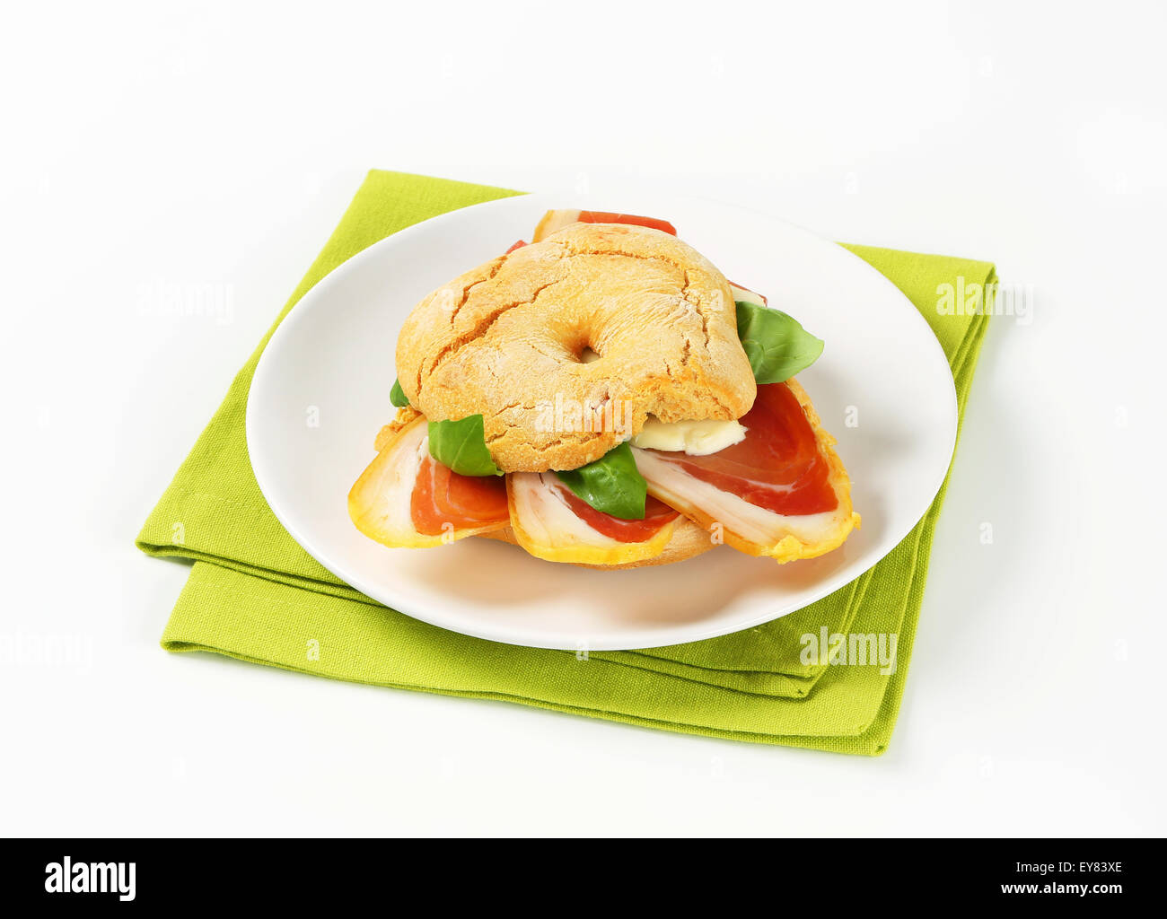 Ring-shaped roll with sliced prosciutto crudo and mozzarella Stock ...