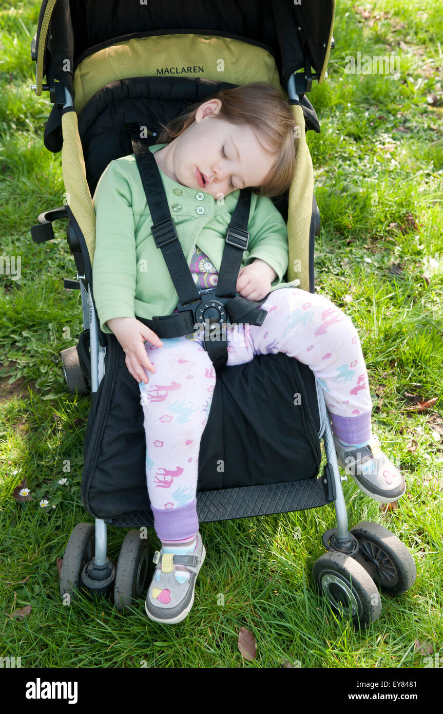 Sleeping in stroller hi-res stock photography and images - Alamy