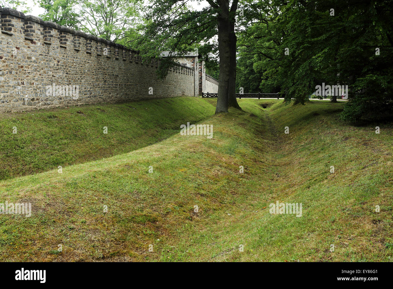 Earthworks by the wall of the reconstructed Roman fort at Saalburg near ...