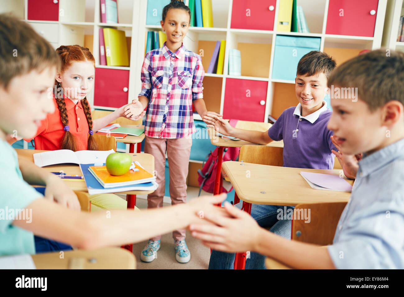 Friendly classmates playing at break between lessons Stock Photo - Alamy