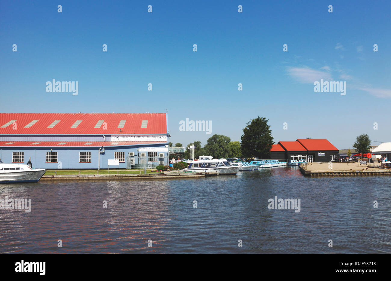 A boatyard by the River Thurne on the Norfolk Broads at Potter Heigham ...