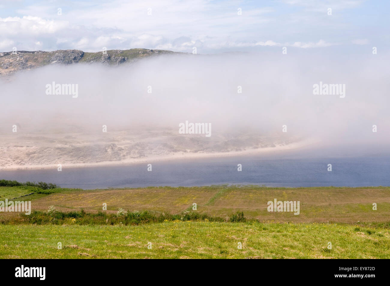 Rolling mist coming over the landscape on the north coast of Scotland ...