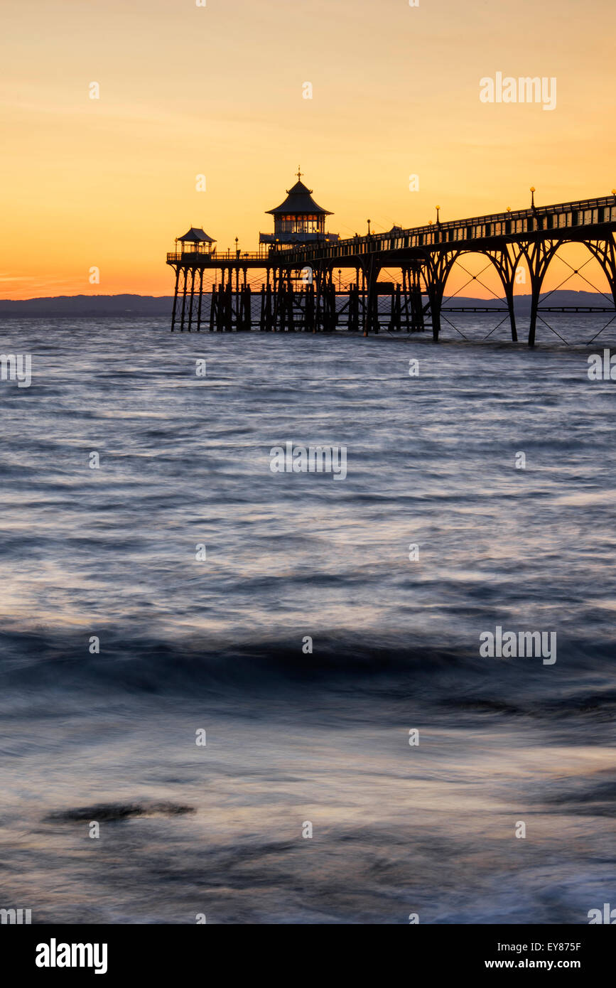 Stunning long exposure sunset over ocean with pier silhouette Stock ...
