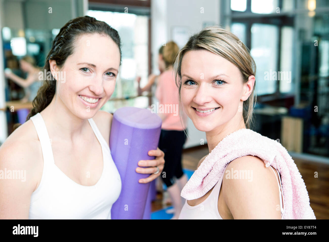 Women take a break on Pilates class Stock Photo - Alamy