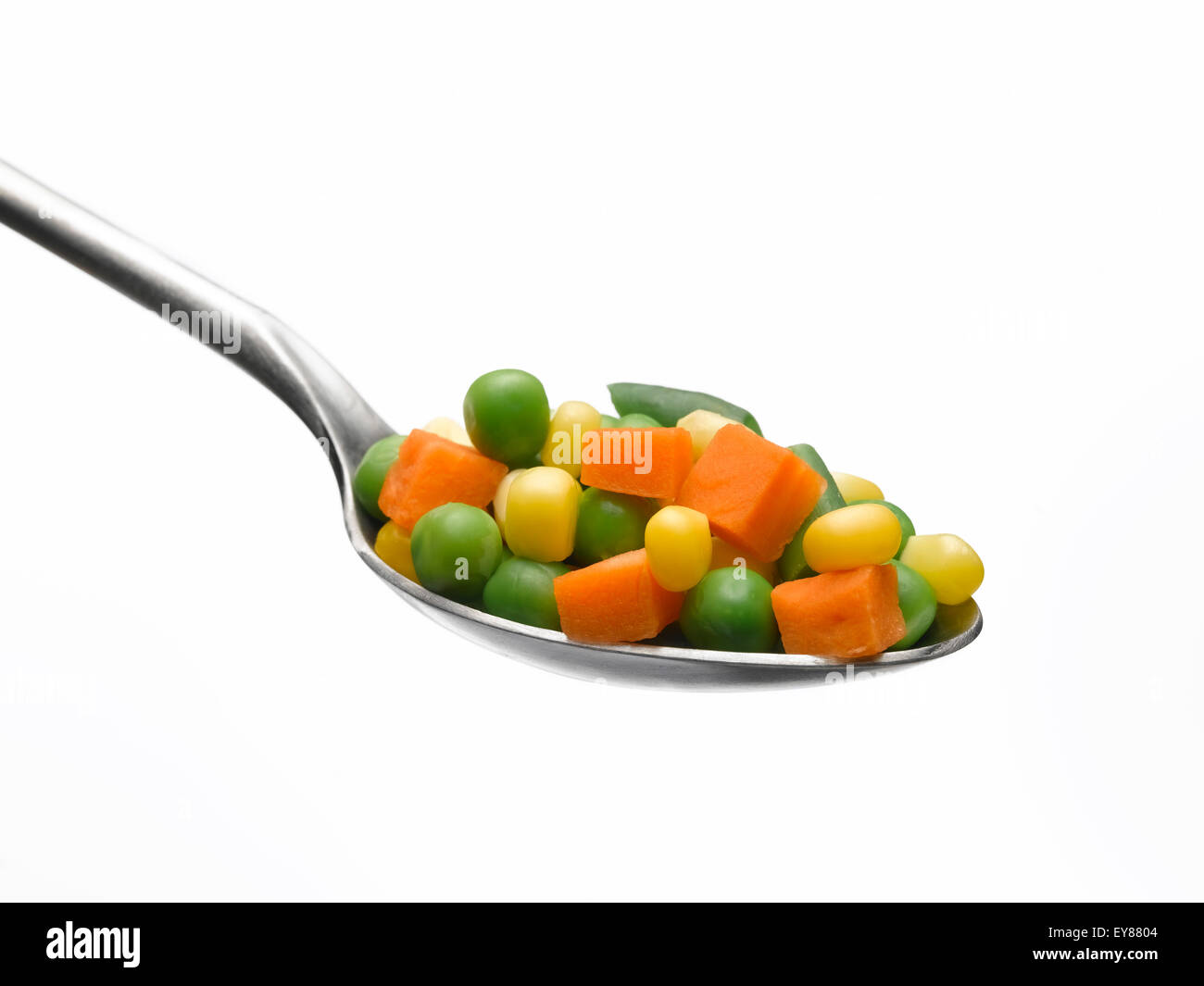Chopped vegetables on spoon Stock Photo - Alamy